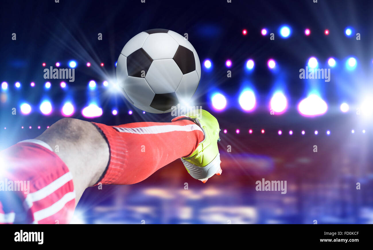 Close up image of footballer foot kicking the ball Stock Photo - Alamy