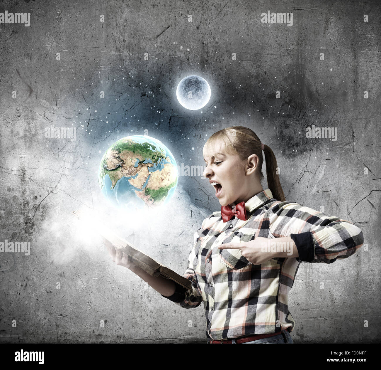 Woman in casual wear holding opened book in hands. Elements of this ...