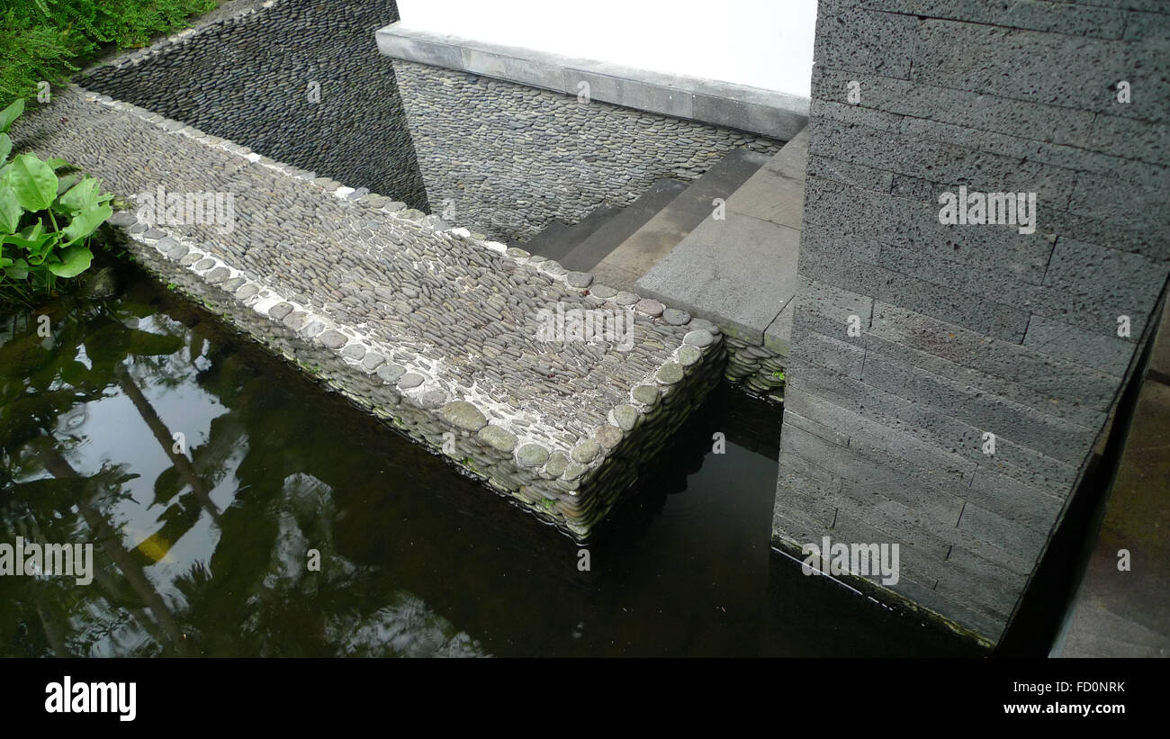 stone wall and stairs with water feature Stock Photo - Alamy