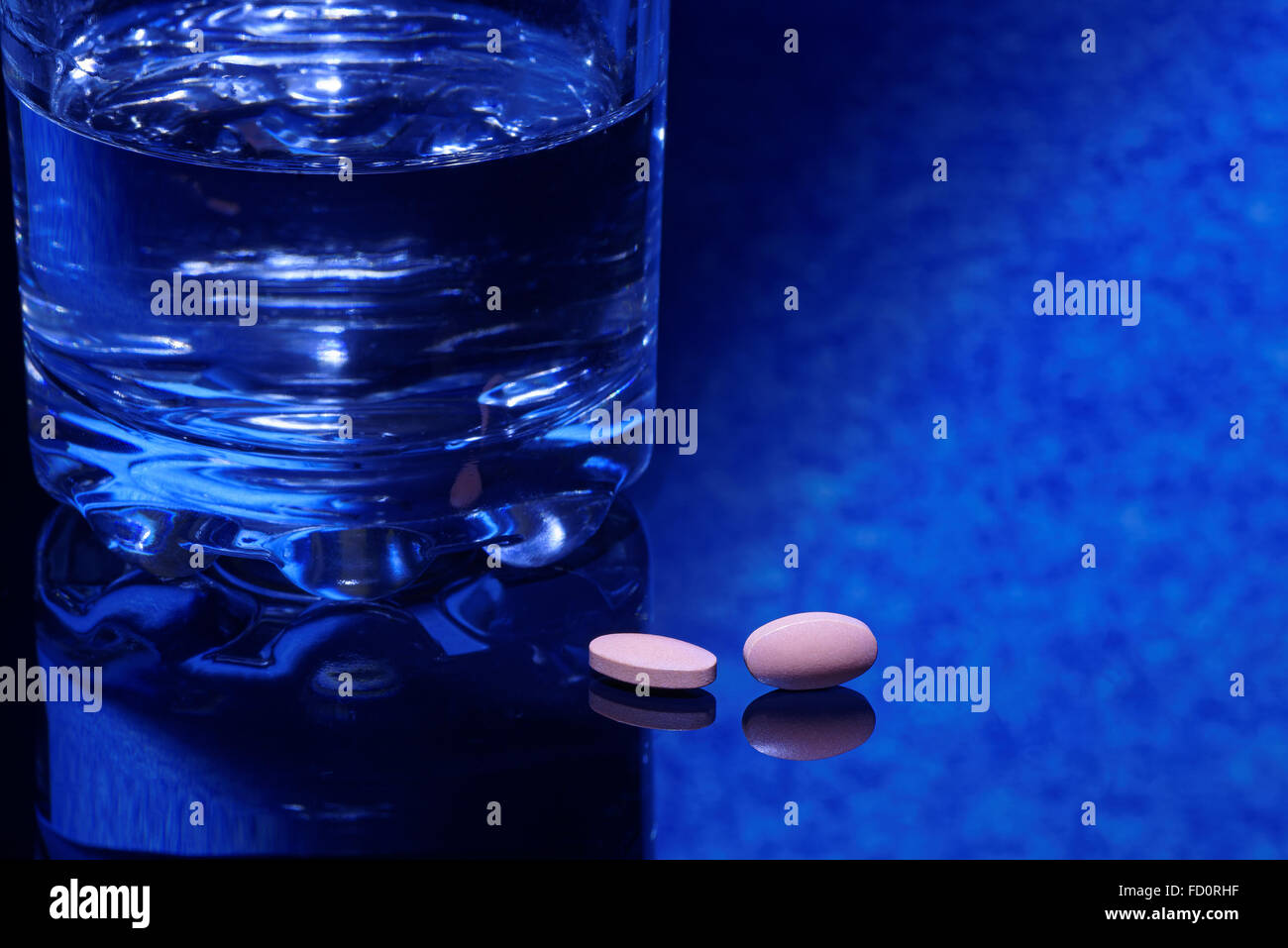 Statins or generic drugs with a glass of water. Health and Medical ...