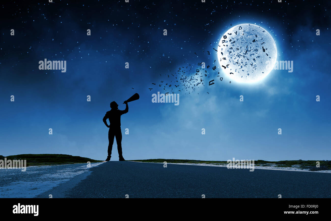 Silhouette of man screaming in trumpet at night Stock Photo - Alamy