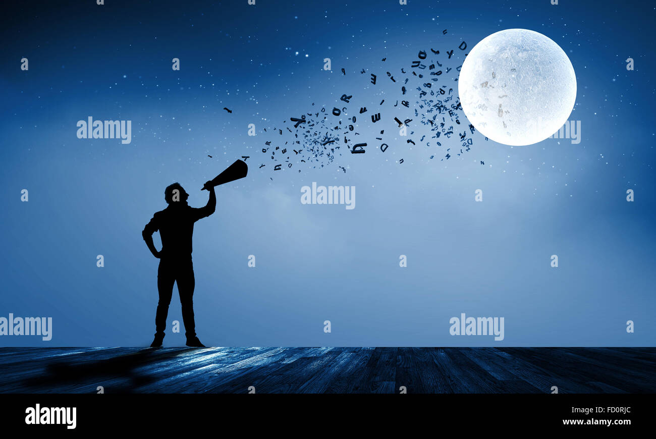 Silhouette of man screaming in trumpet at night Stock Photo - Alamy