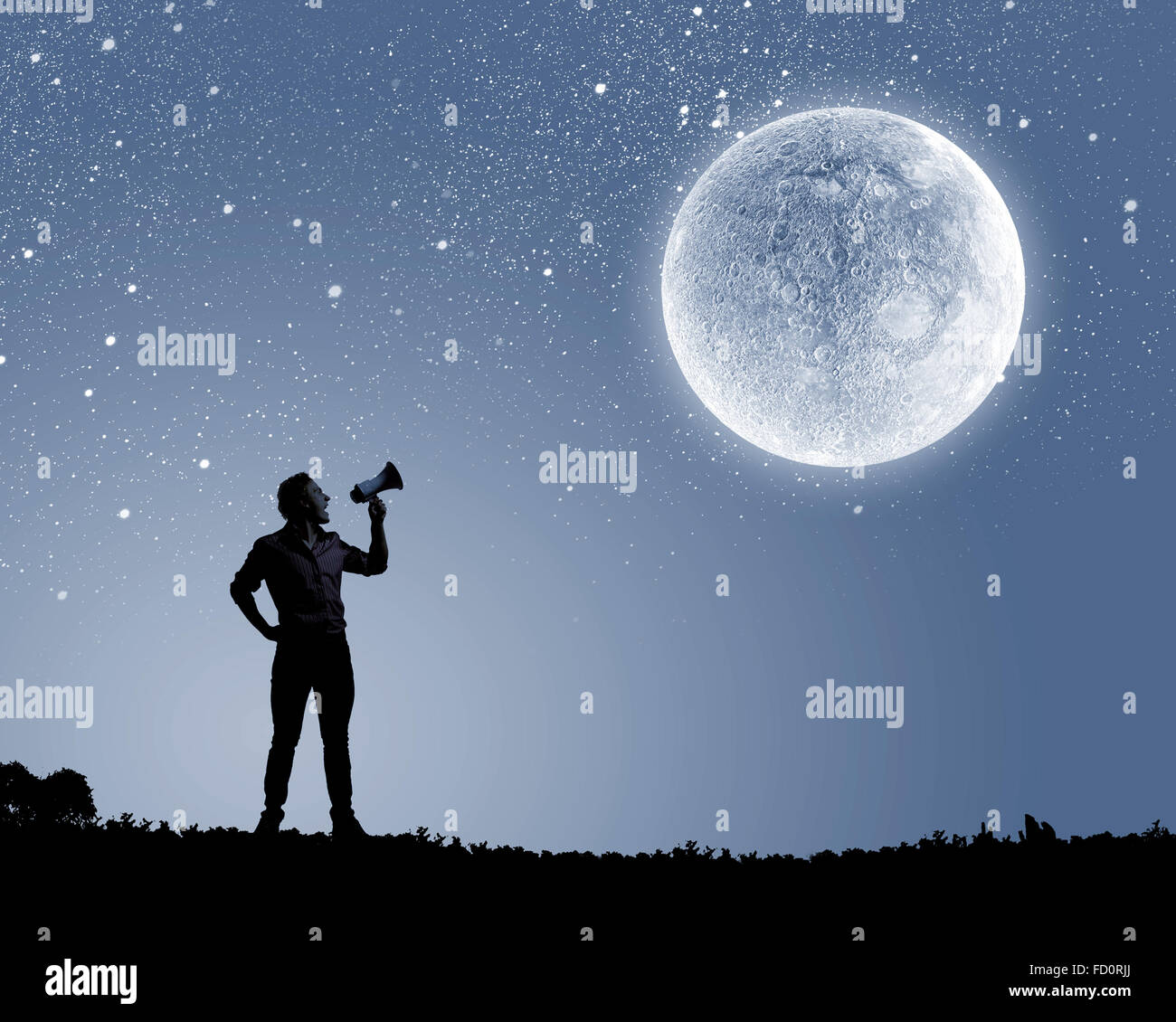 Silhouette of man screaming in trumpet at night Stock Photo - Alamy