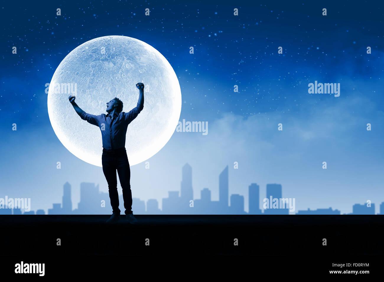Young screaming man at night with big full moon at background Stock ...