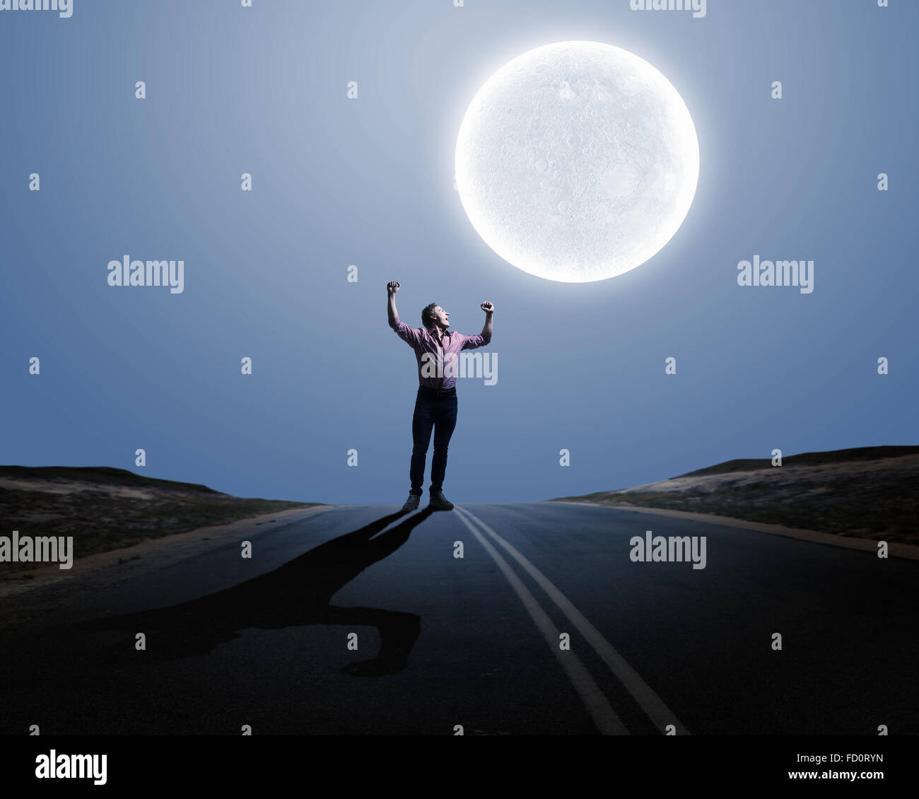 Young screaming man at night with big full moon at background Stock ...