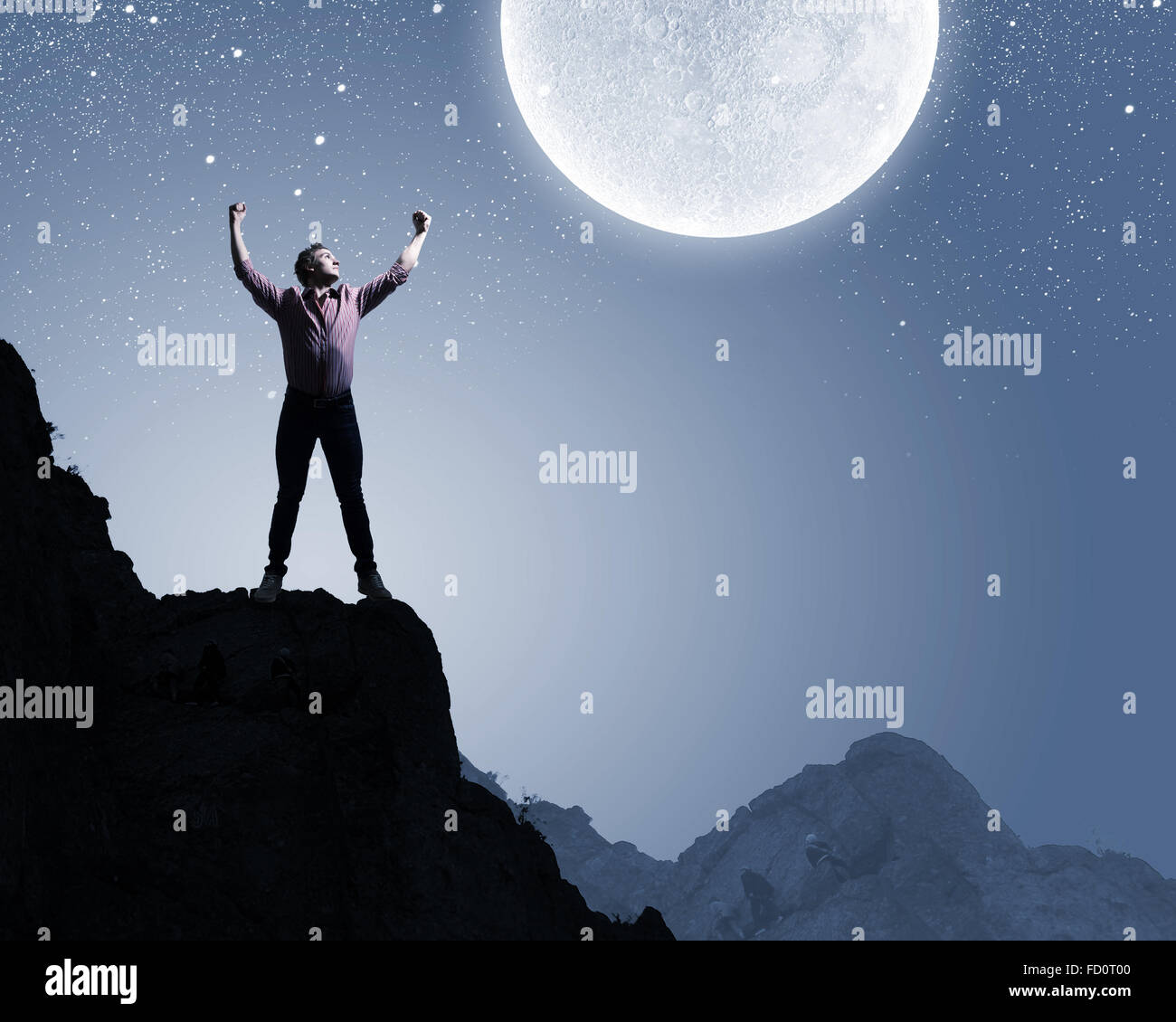 Young man at night with big full moon at background Stock Photo - Alamy