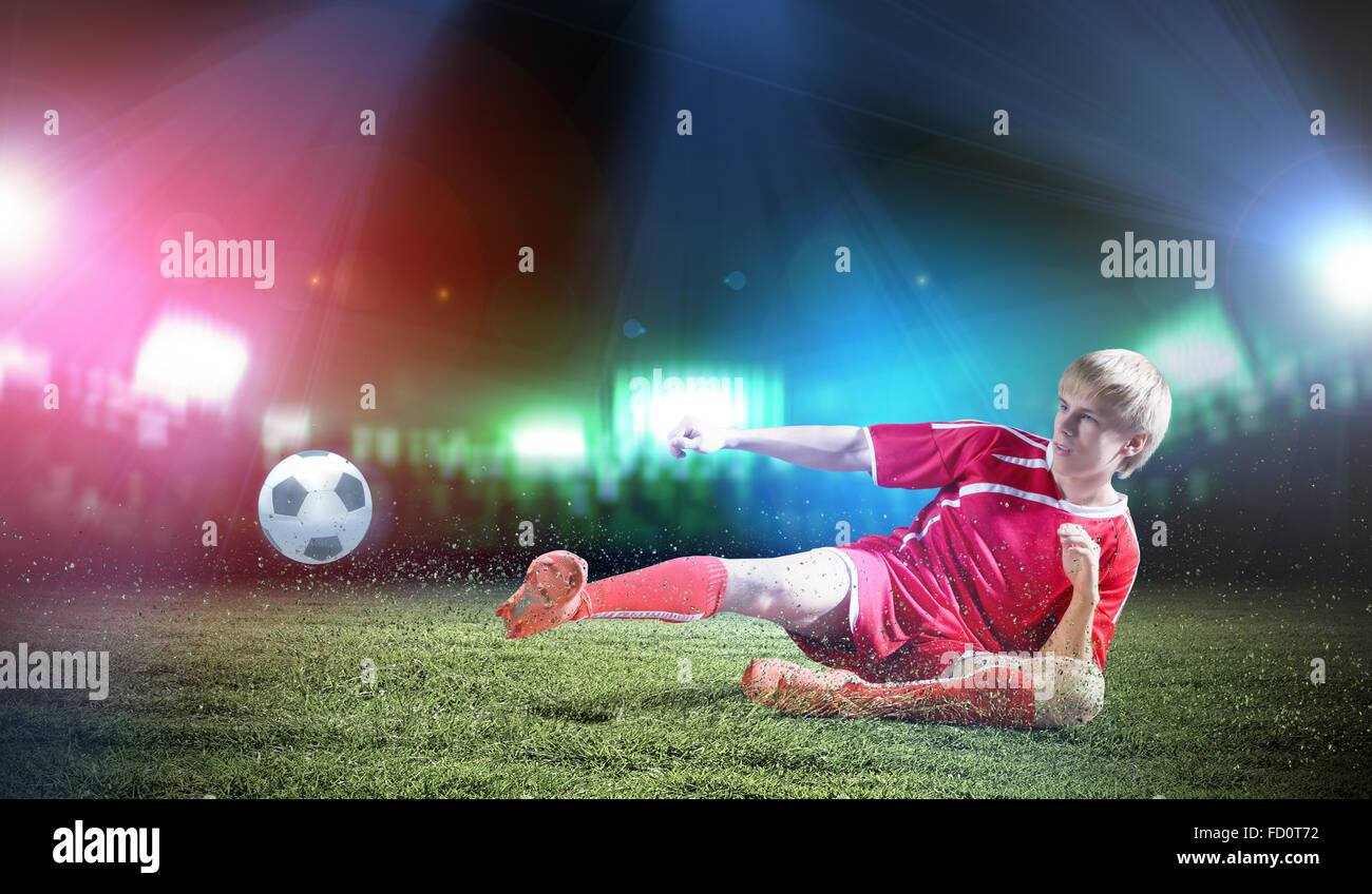 Slide tackle rain hi-res stock photography and images - Alamy