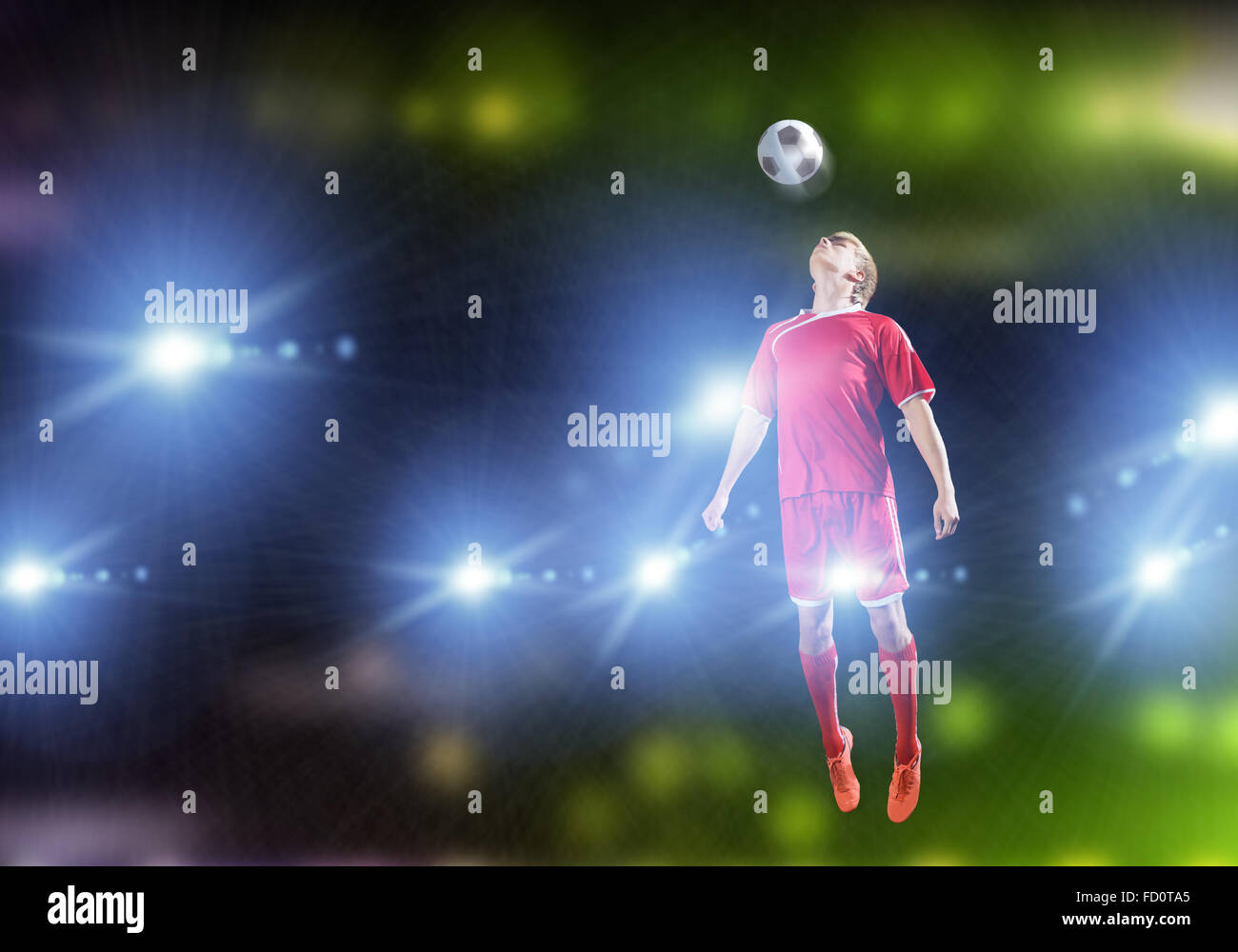 Football jump header goal hi-res stock photography and images - Alamy