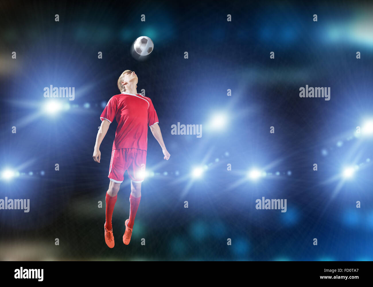 Football jump header goal hi-res stock photography and images - Alamy