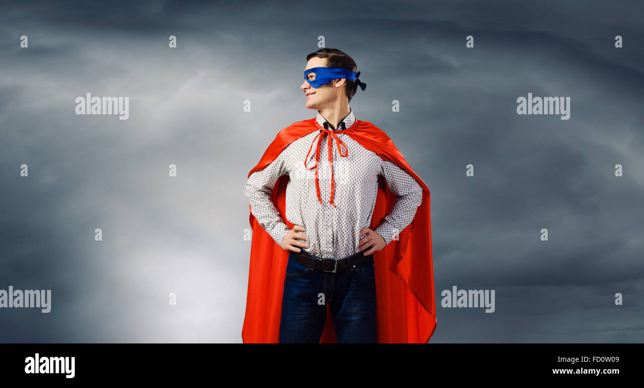Young man wearing superman mask and cape Stock Photo - Alamy