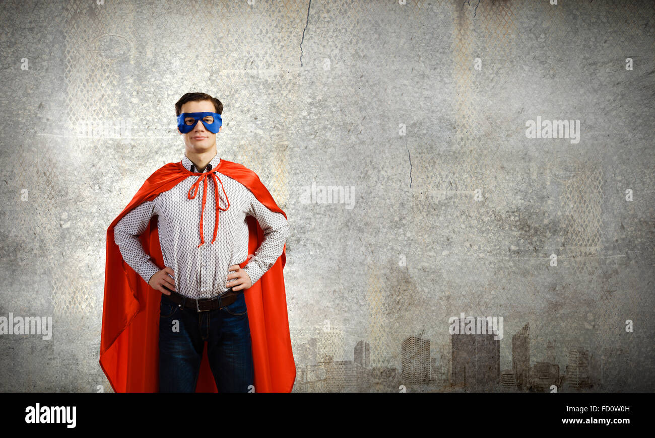 Young man wearing superman mask and cape Stock Photo - Alamy