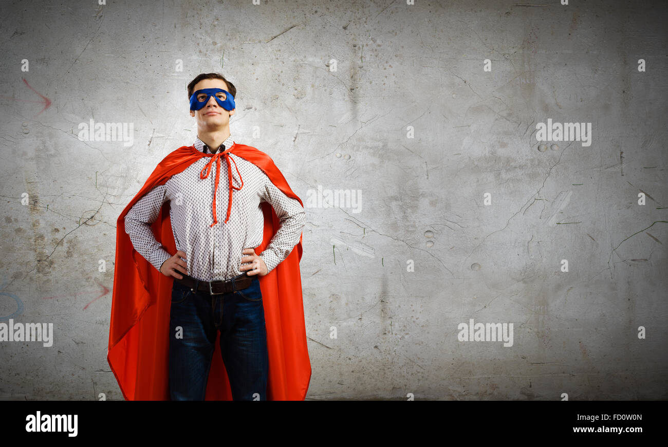 Young man wearing superman mask and cape Stock Photo - Alamy