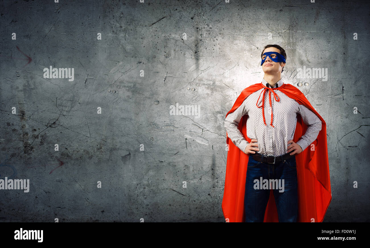 Young man wearing superman mask and cape Stock Photo - Alamy