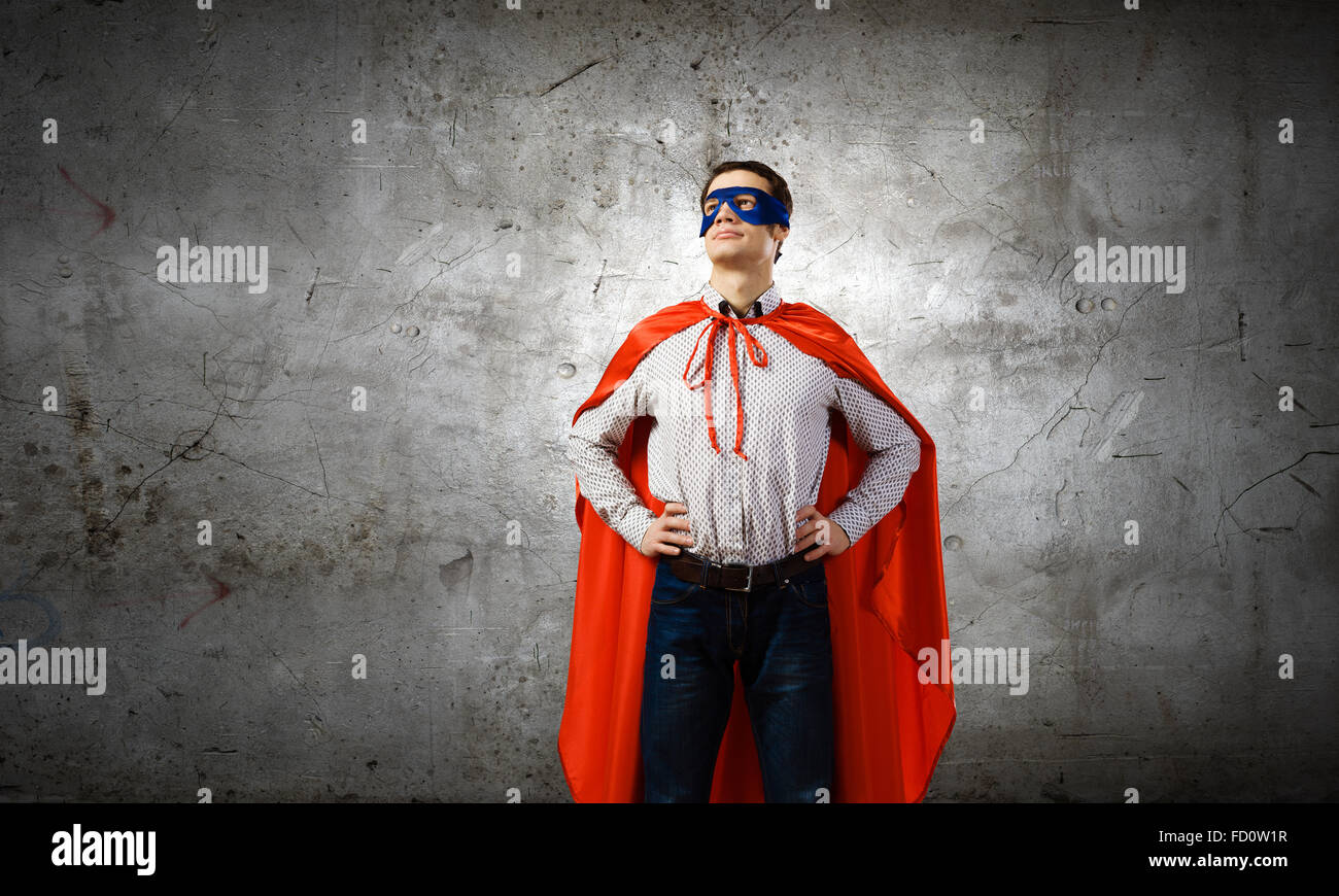 Young man wearing superman mask and cape Stock Photo - Alamy