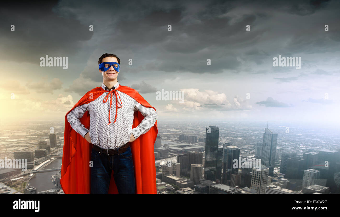 Young man wearing superman mask and cape Stock Photo - Alamy