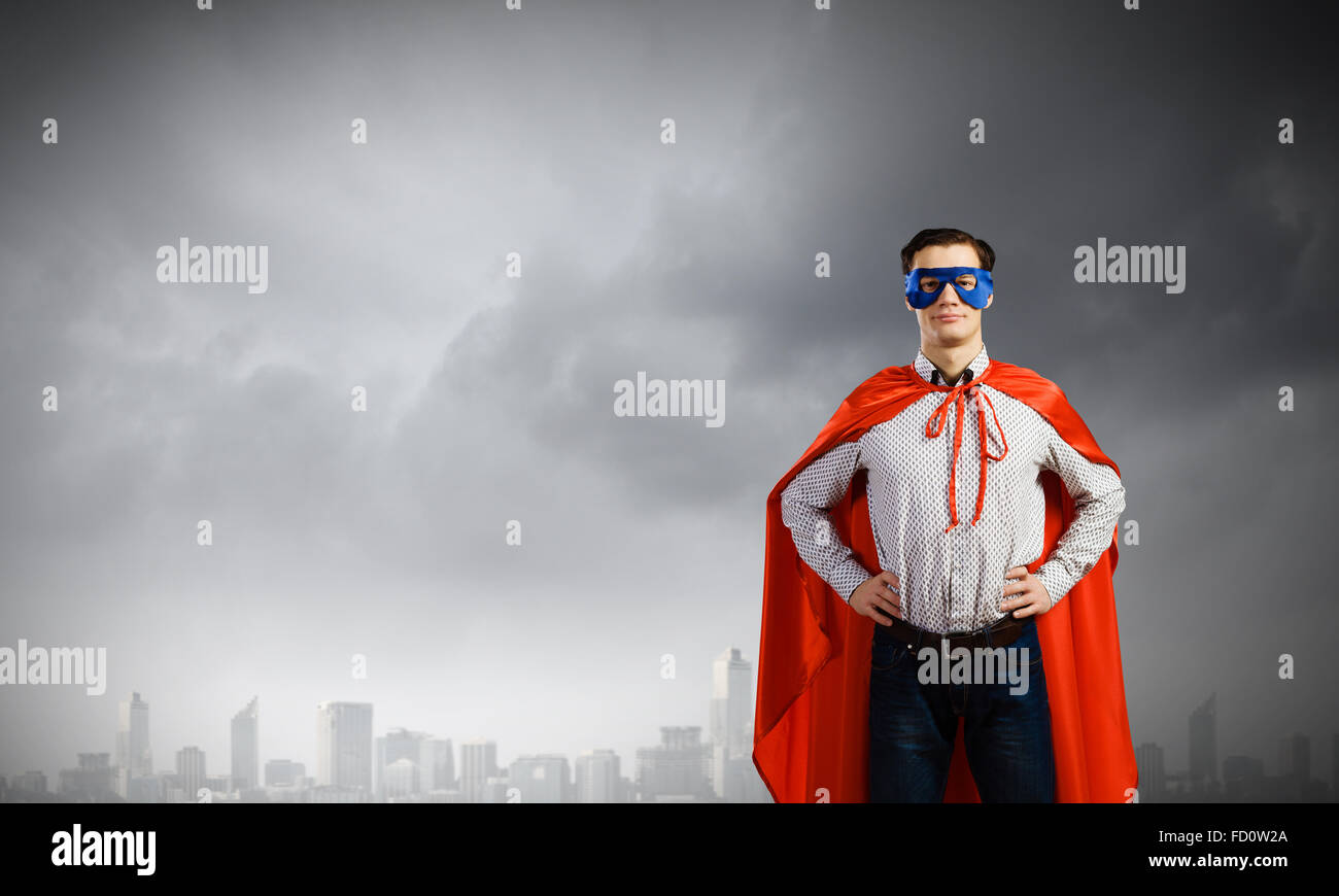 Young man wearing superman mask and cape Stock Photo - Alamy