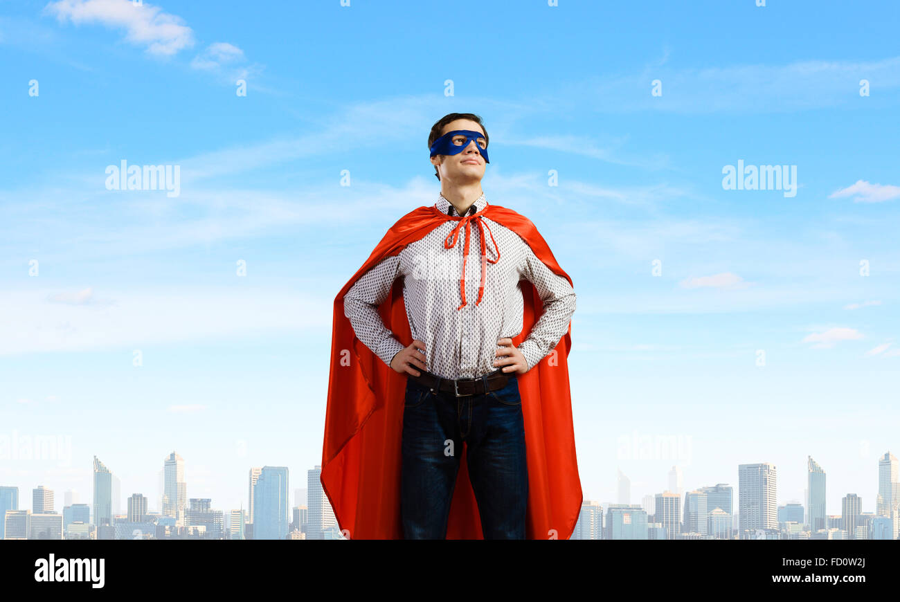Young man wearing superman mask and cape Stock Photo - Alamy