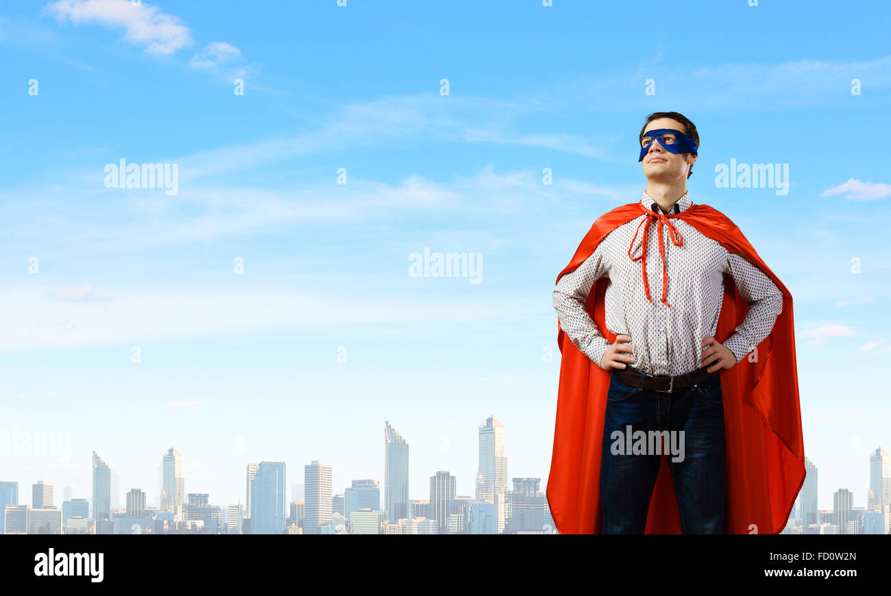 Young man wearing superman mask and cape Stock Photo - Alamy