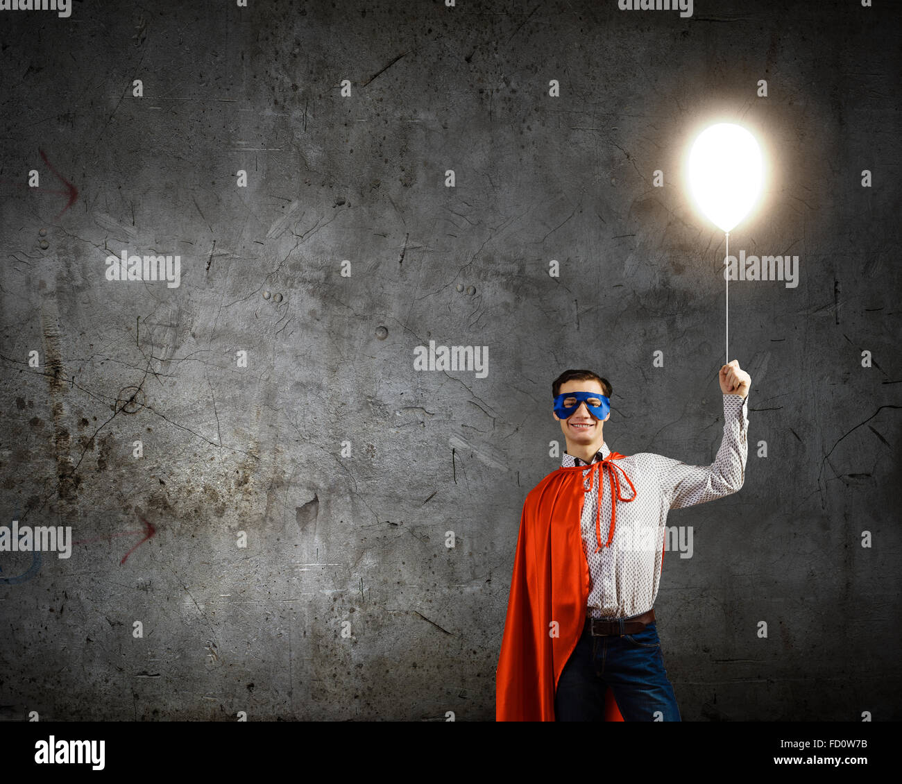 Young confident superman in mask and cape Stock Photo - Alamy
