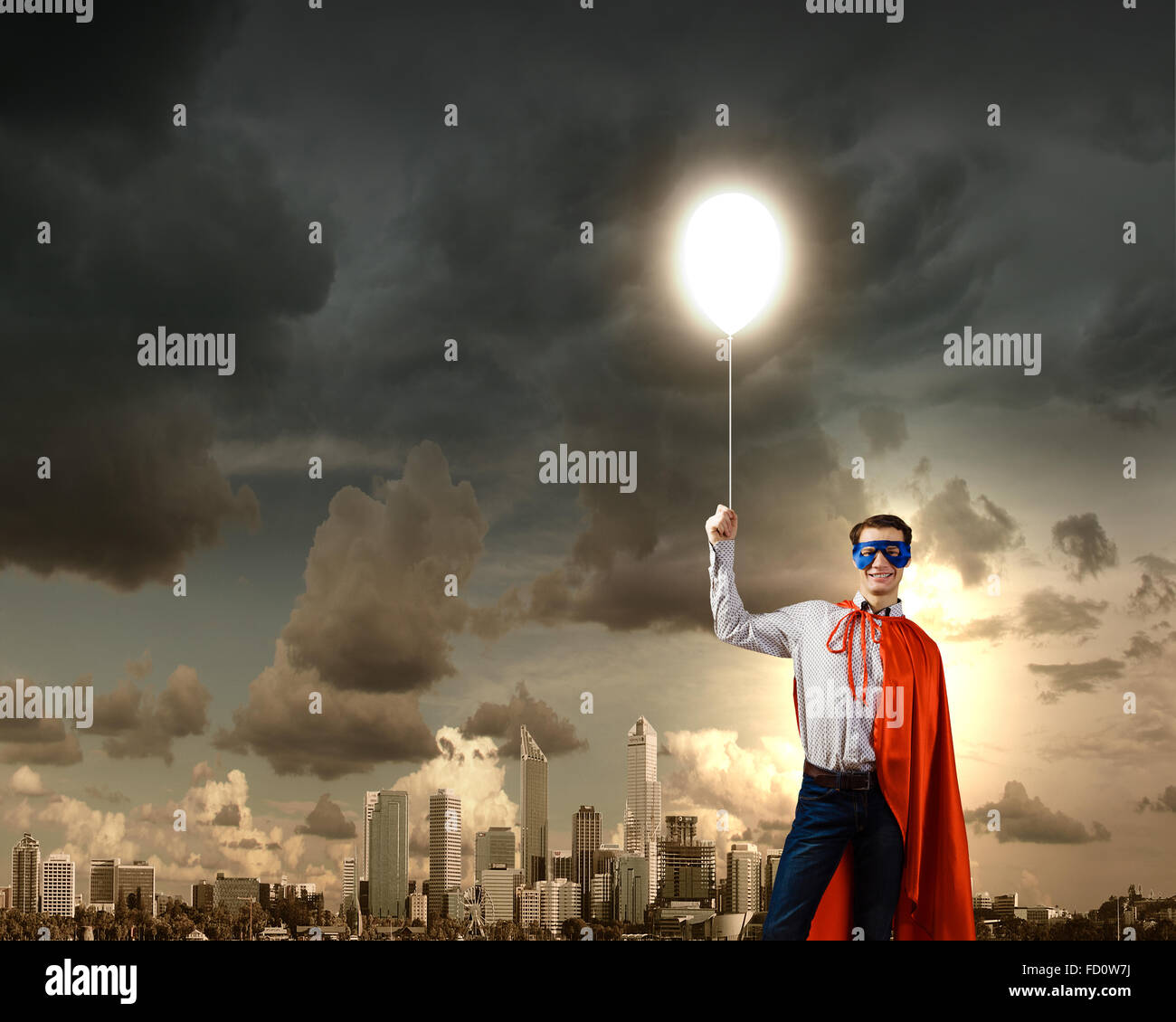 Young confident superman in mask and cape Stock Photo - Alamy