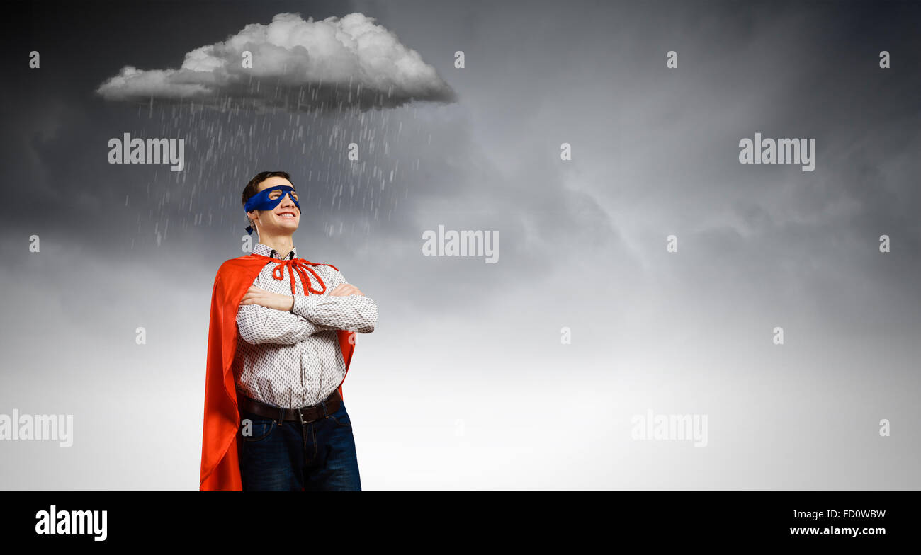 Young man wearing superman mask and cape Stock Photo - Alamy