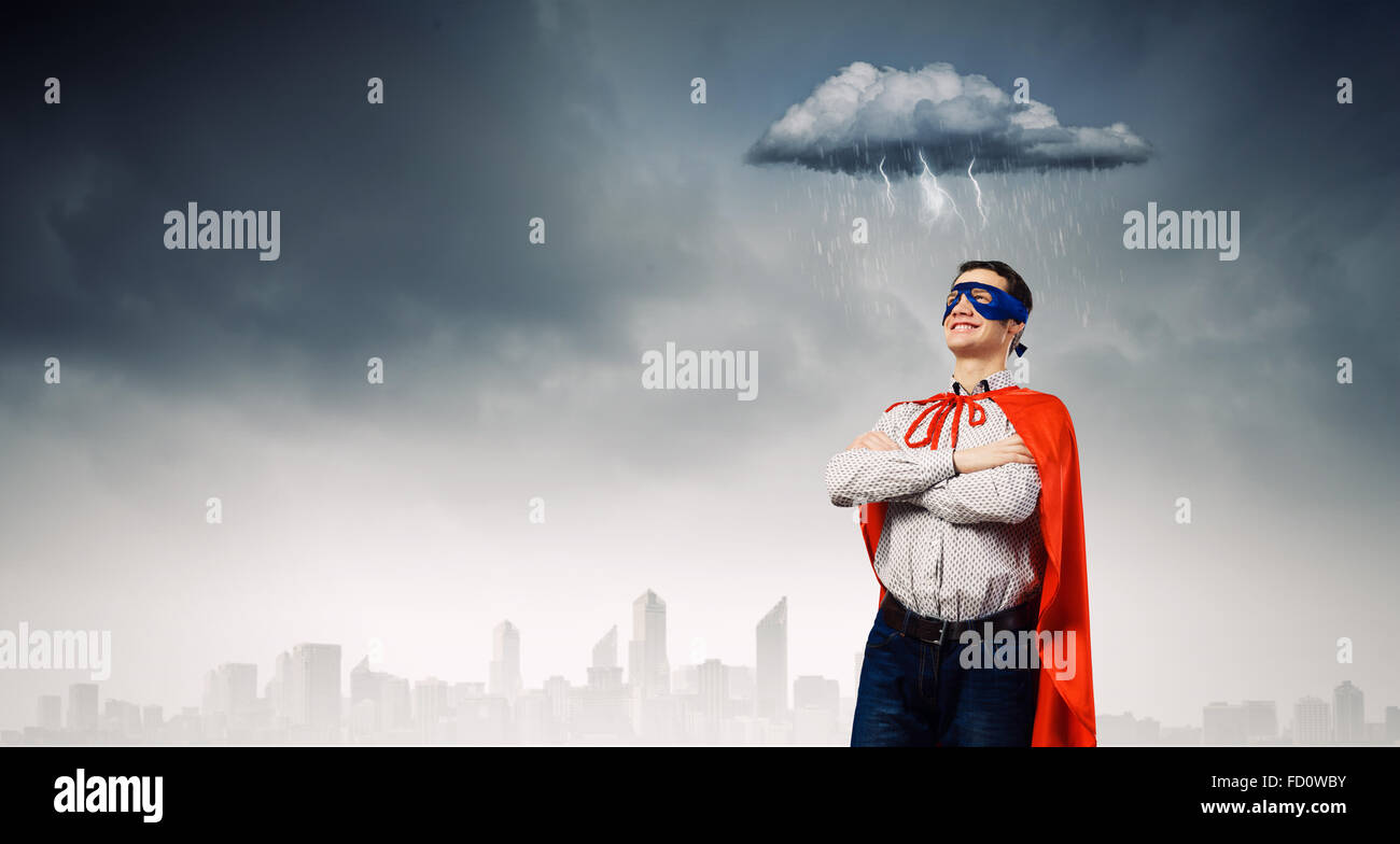 Young man wearing superman mask and cape Stock Photo - Alamy