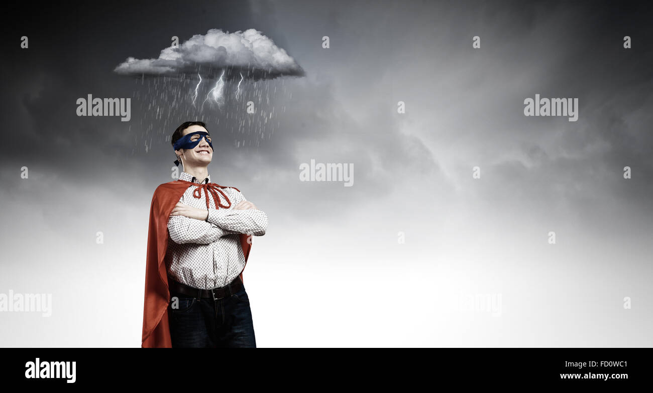Young man wearing superman mask and cape Stock Photo - Alamy