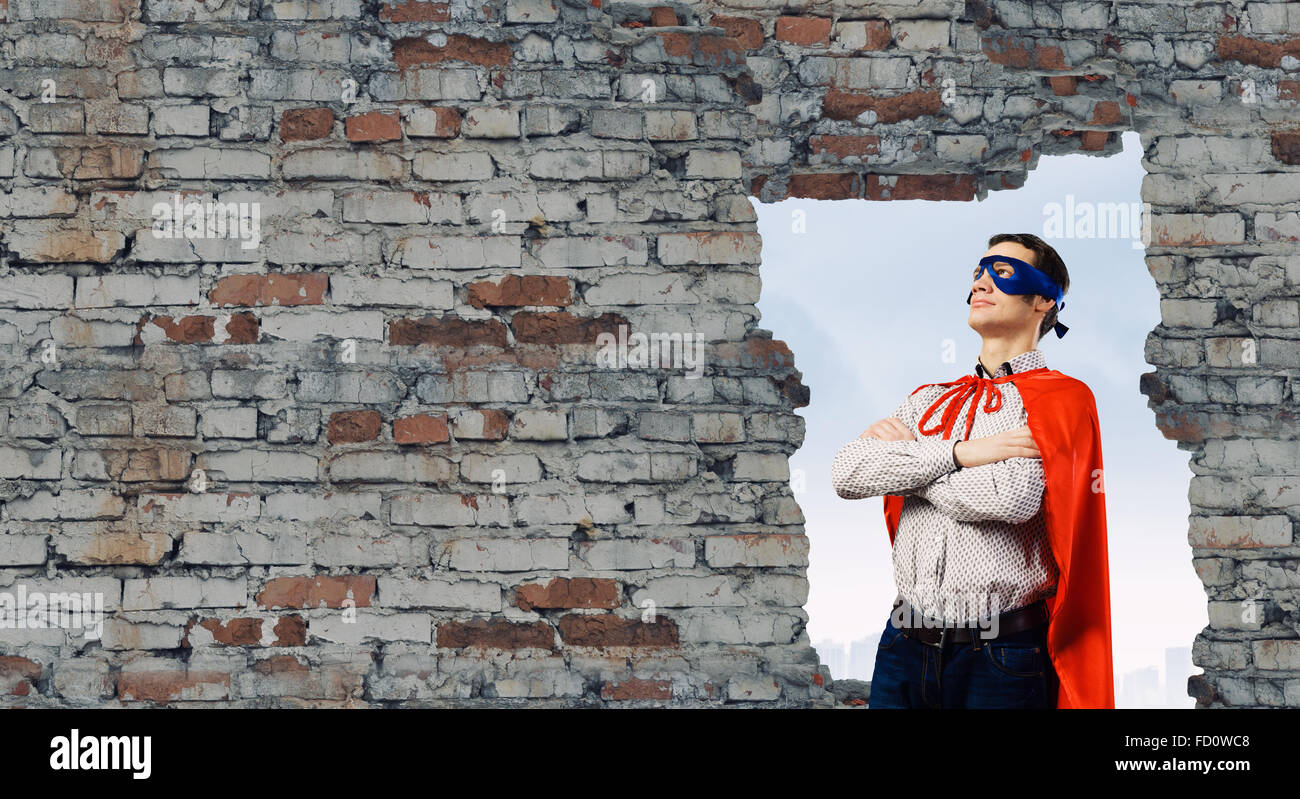 Young man wearing superman mask and cape Stock Photo - Alamy