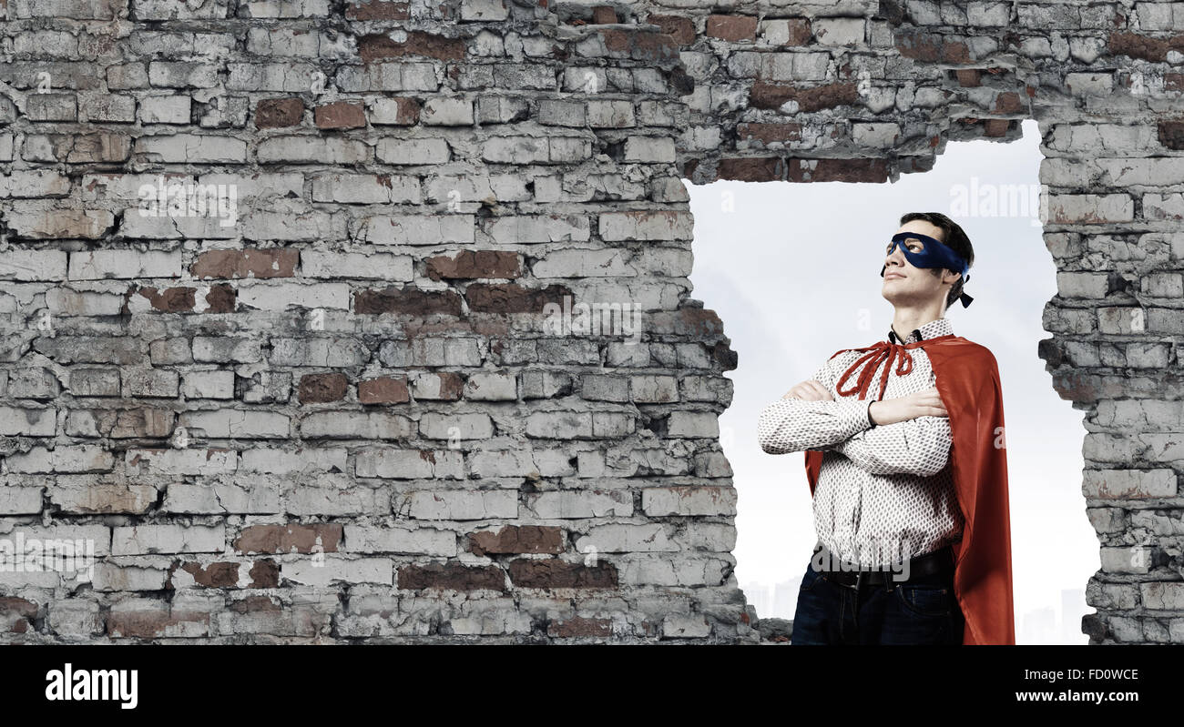 Young man wearing superman mask and cape Stock Photo - Alamy