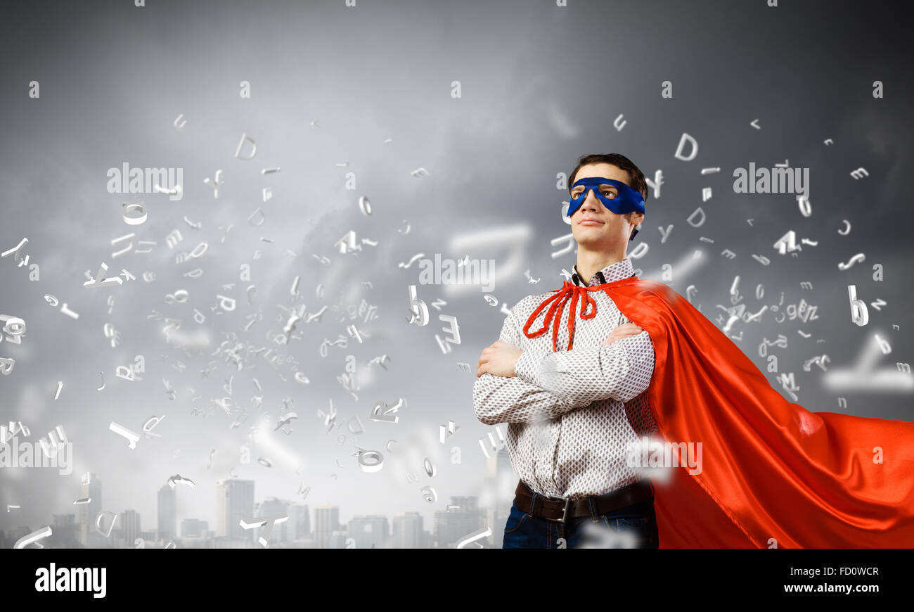 Young man wearing superman mask and cape Stock Photo - Alamy
