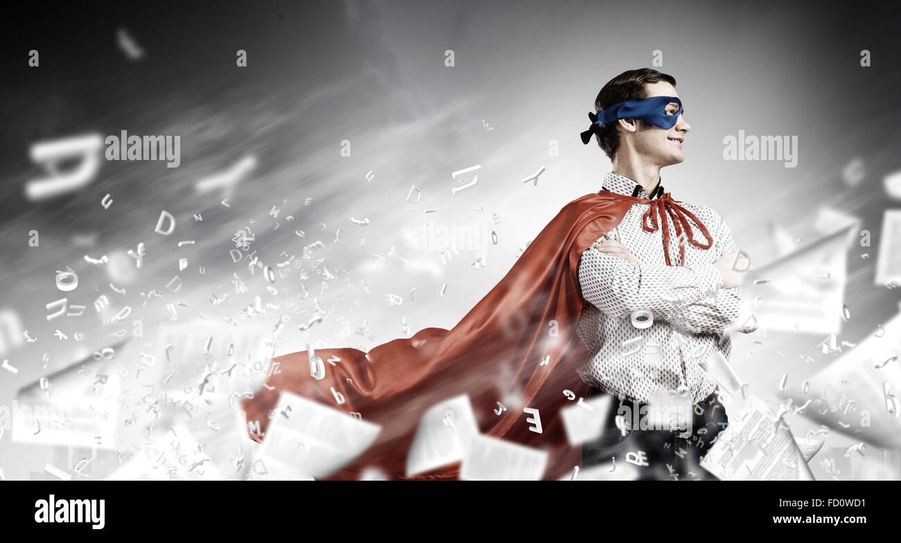 Young man wearing superman mask and cape Stock Photo - Alamy