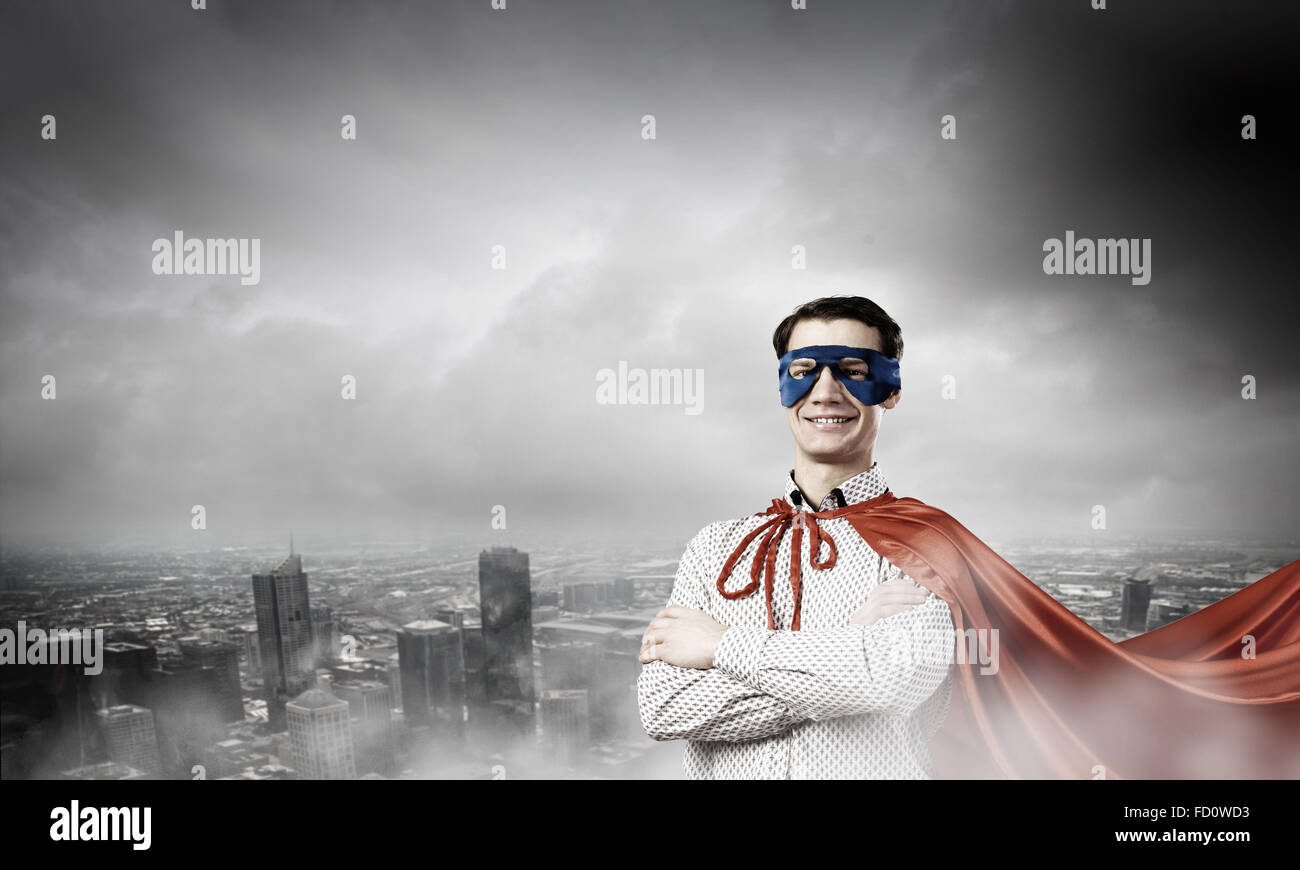 Young man wearing superman mask and cape Stock Photo - Alamy
