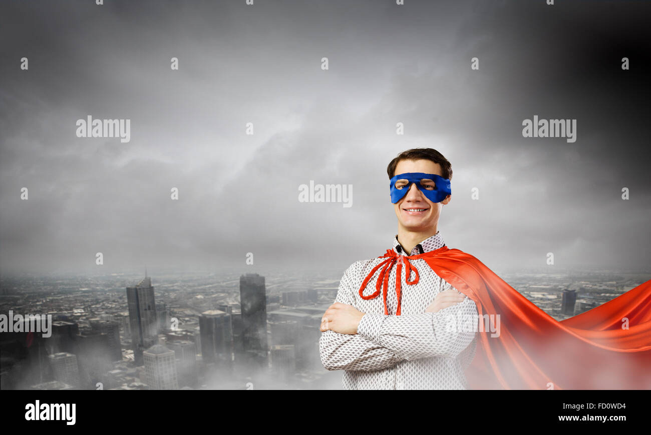 Young man wearing superman mask and cape Stock Photo - Alamy