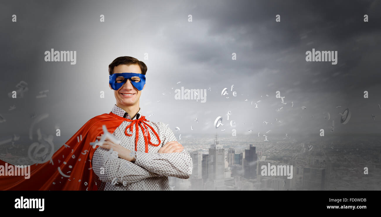 Young man wearing superman mask and cape Stock Photo - Alamy