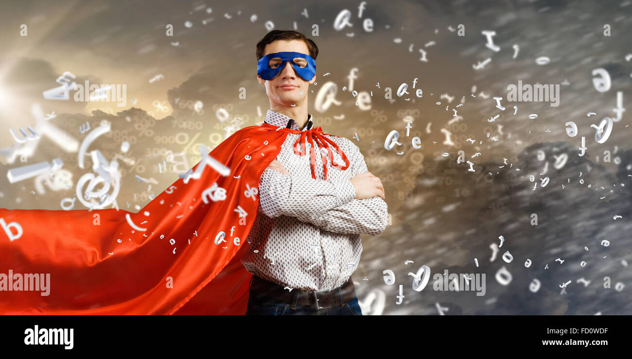 Young man wearing superman mask and cape Stock Photo - Alamy