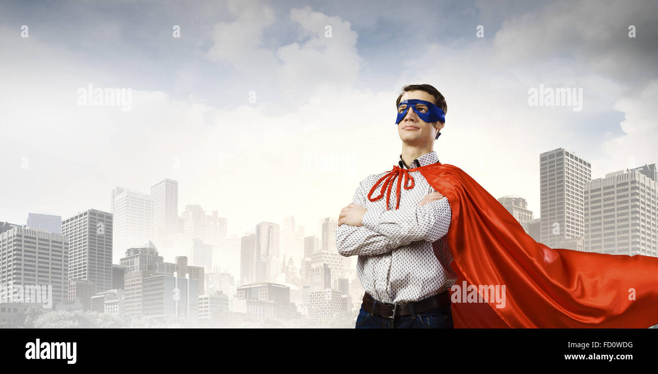 Young man wearing superman mask and cape Stock Photo - Alamy