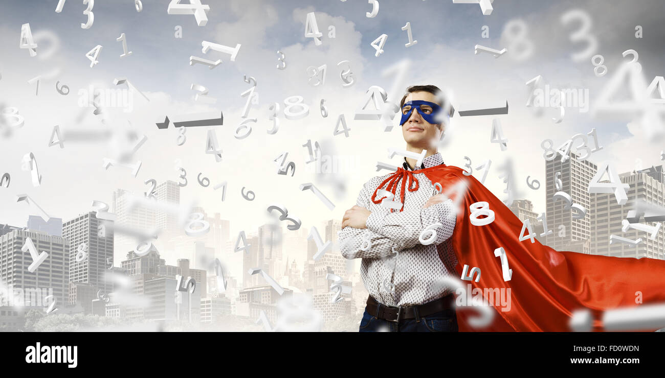 Young man wearing superman mask and cape Stock Photo - Alamy