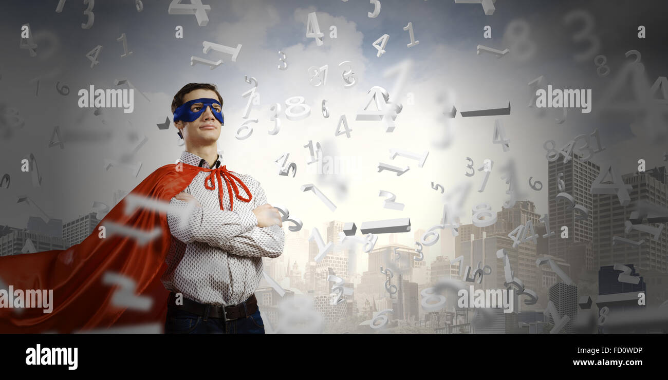 Young man wearing superman mask and cape Stock Photo - Alamy