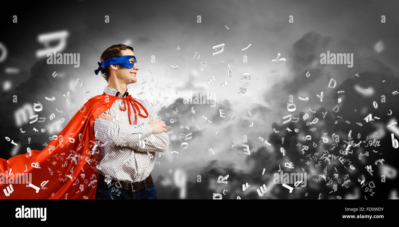 Young man wearing superman mask and cape Stock Photo - Alamy