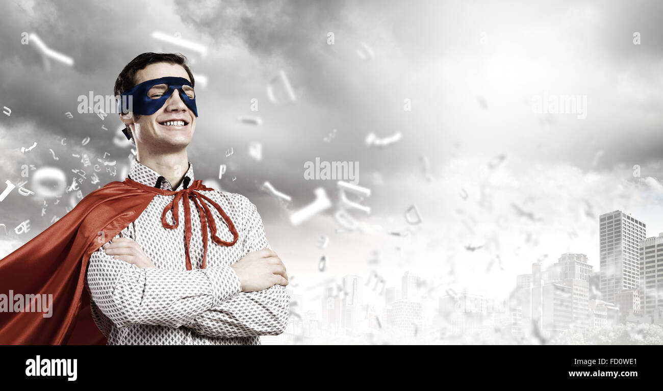 Young man wearing superman mask and cape Stock Photo - Alamy