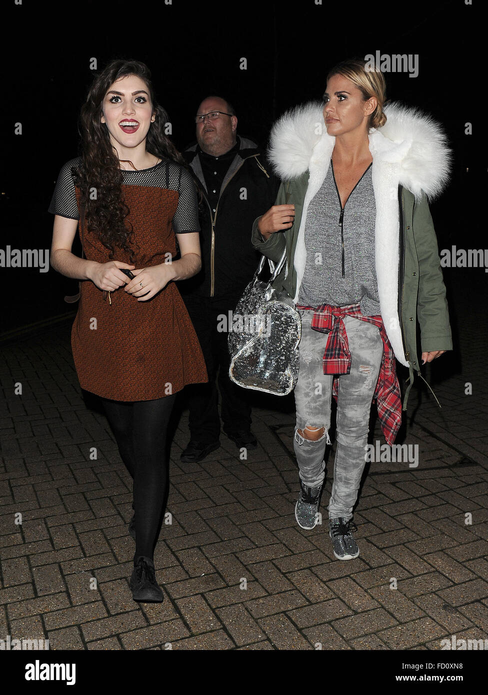 Katie Price leaves the New Woking Theatre with co-star Carla Nella ...