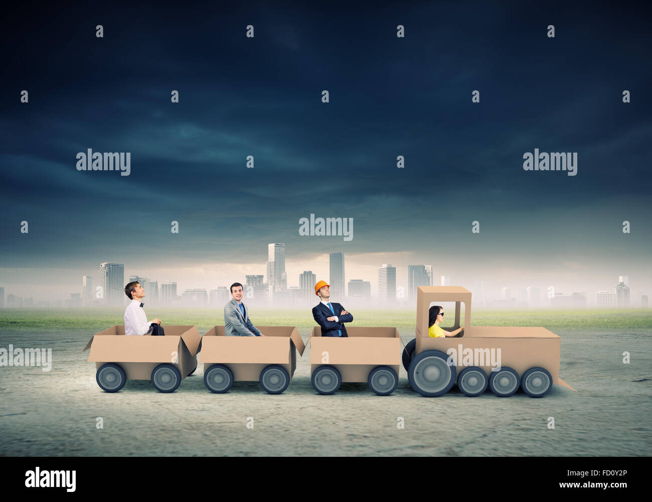 Business people riding carton train. Teamwork concept Stock Photo - Alamy