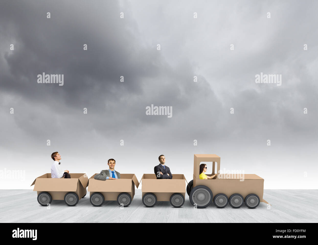 Business people riding carton train. Teamwork concept Stock Photo - Alamy