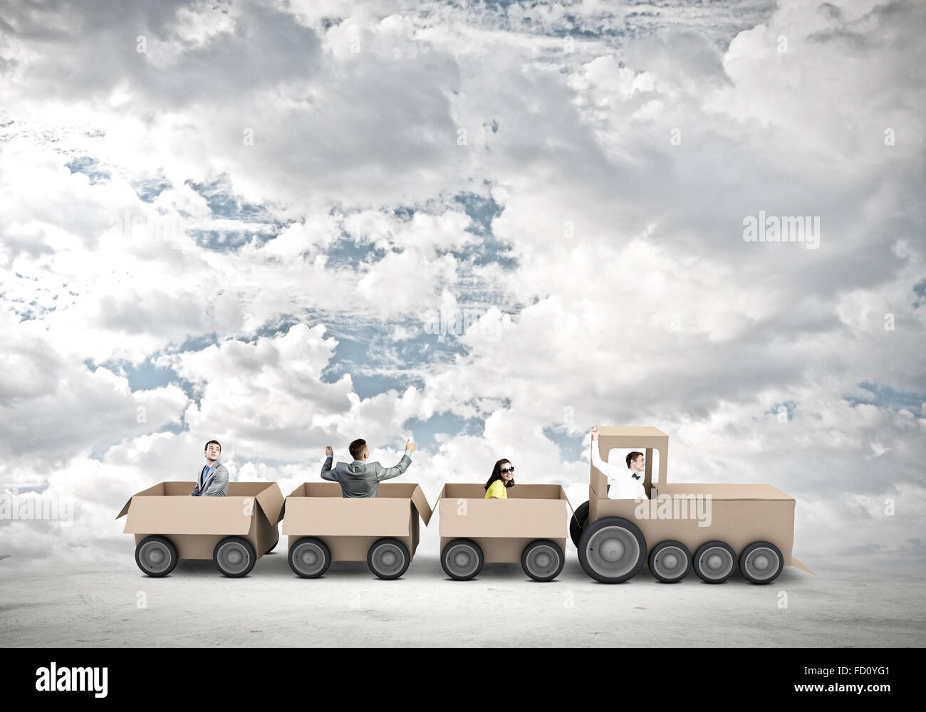 Business people riding carton train. Teamwork concept Stock Photo - Alamy