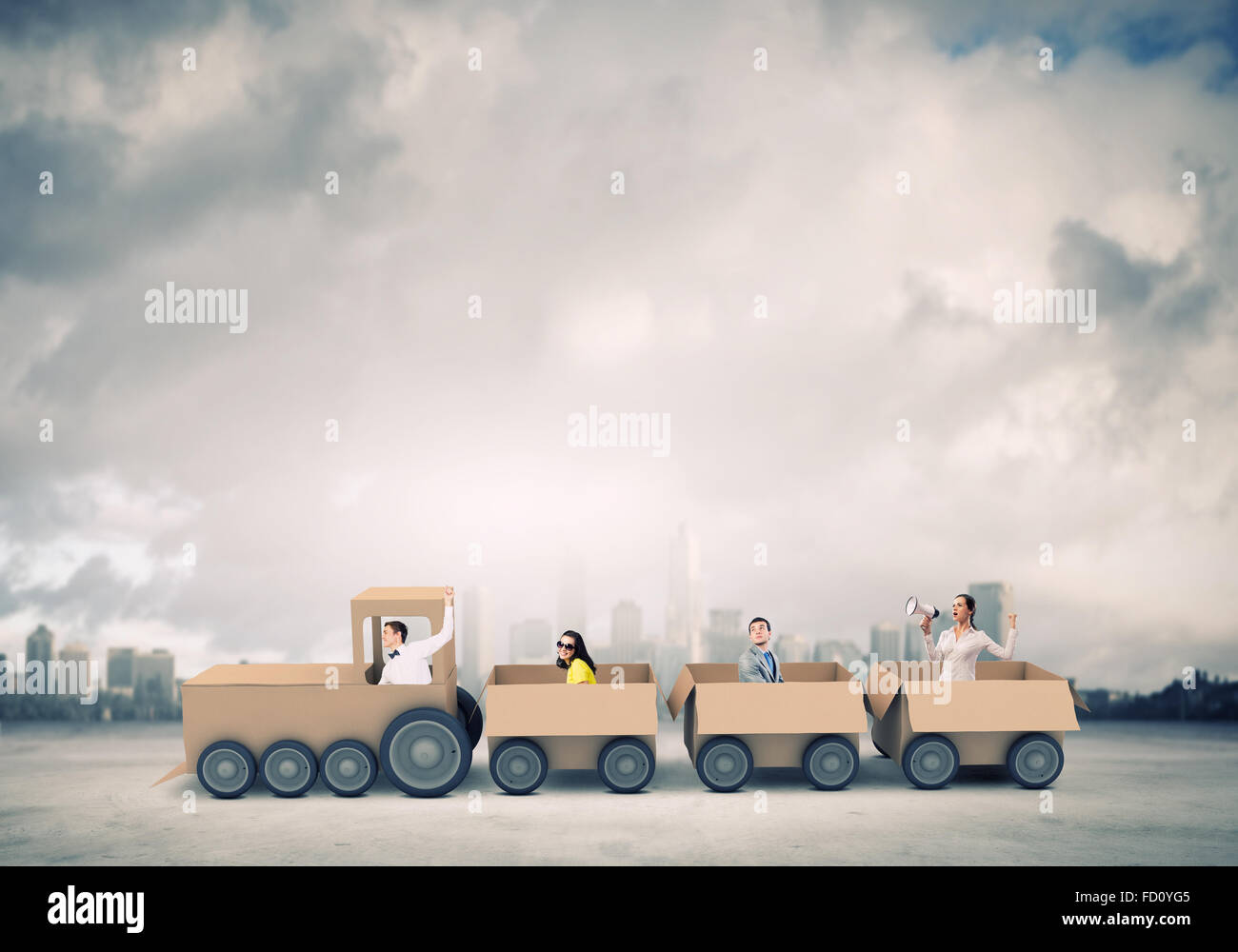 Business people riding carton train. Teamwork concept Stock Photo - Alamy