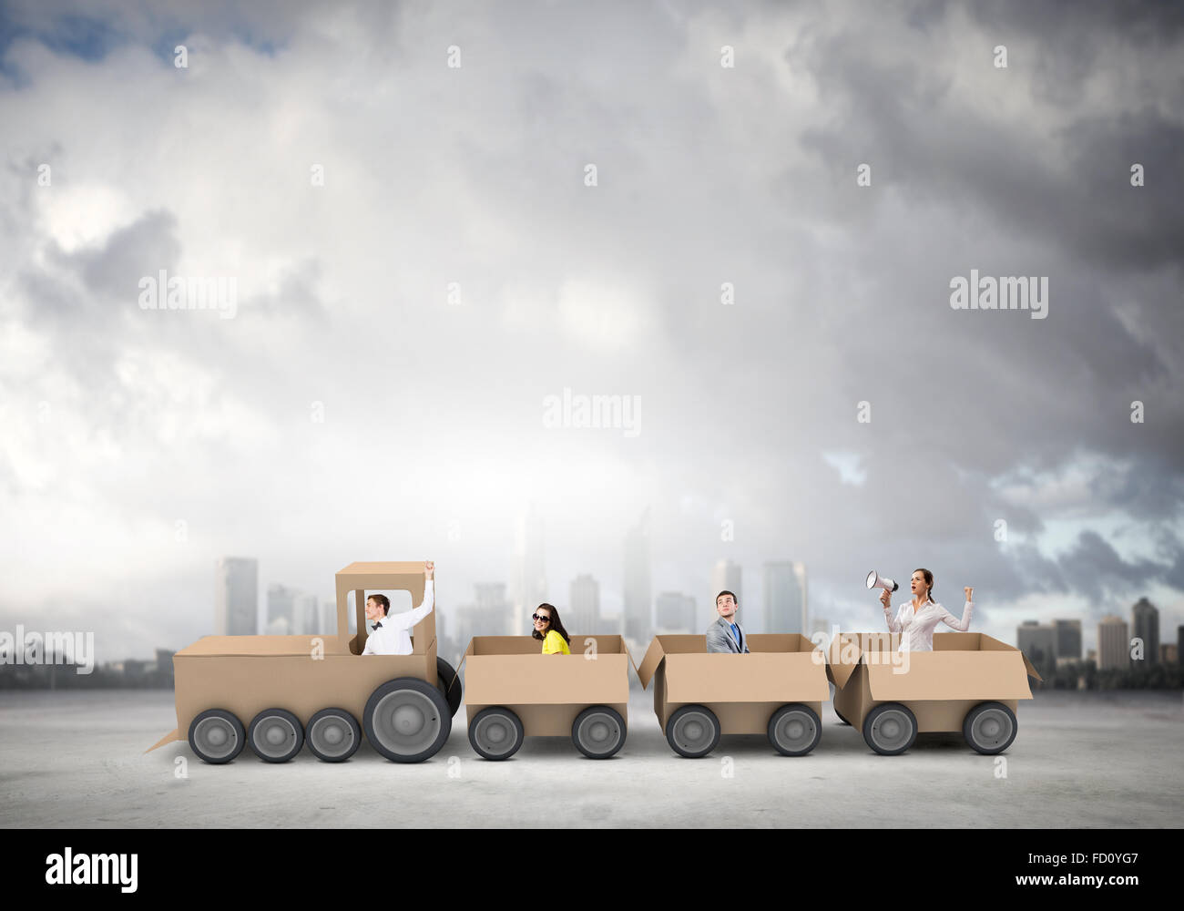 Business people riding carton train. Teamwork concept Stock Photo - Alamy