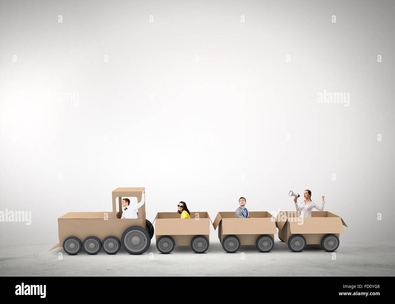 Business people riding carton train. Teamwork concept Stock Photo - Alamy