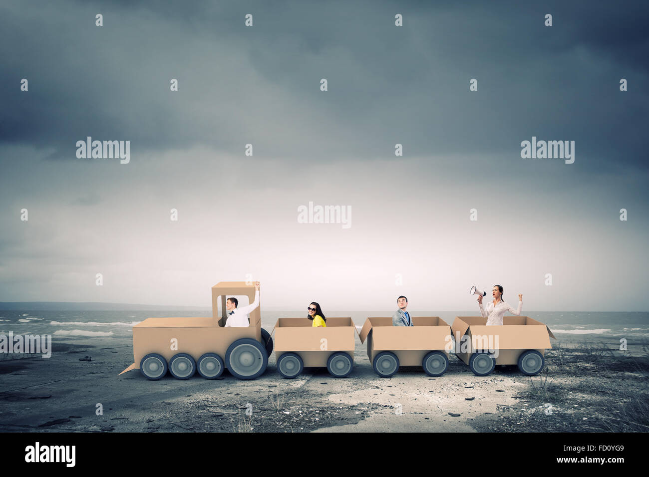 Business people riding carton train. Teamwork concept Stock Photo - Alamy
