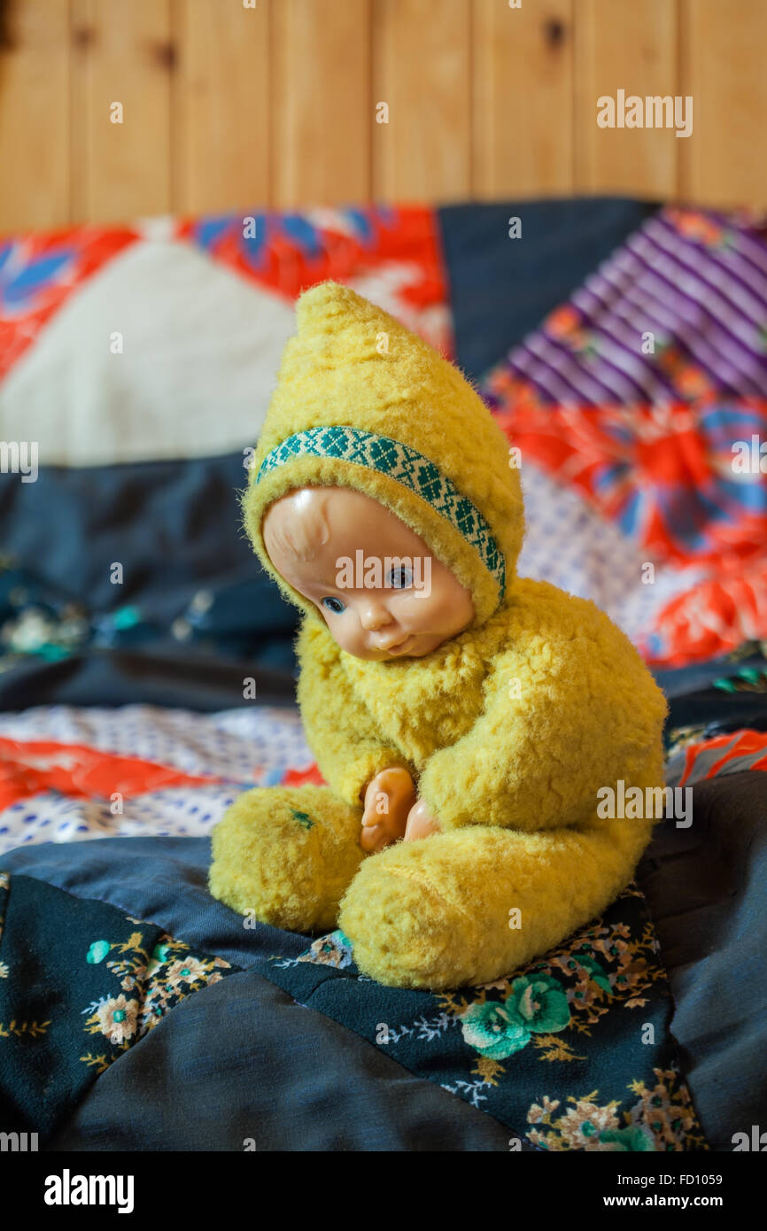 Old baby toy from USSR sitting alone on handmade blanket Stock Photo ...