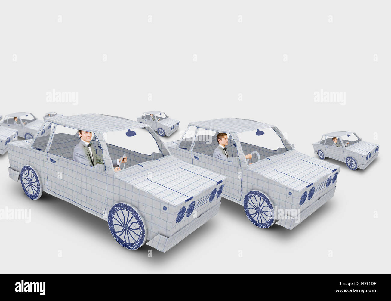 Young man driving car made of sheet of paper Stock Photo - Alamy